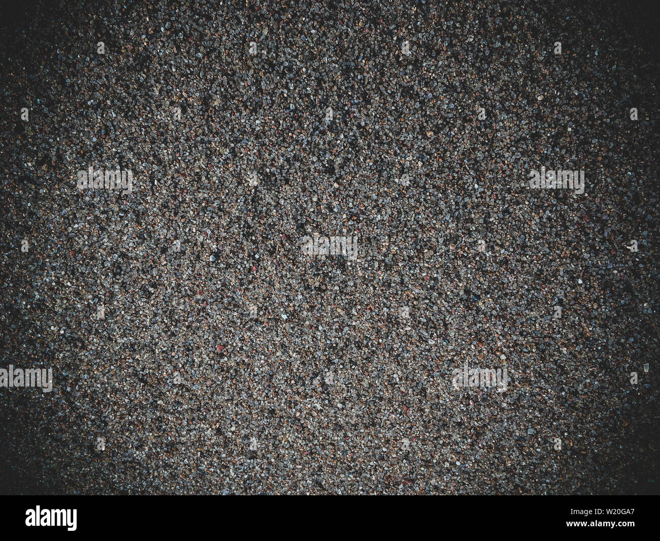 small sand grains of sand top view dark designer background Stock Photo ...