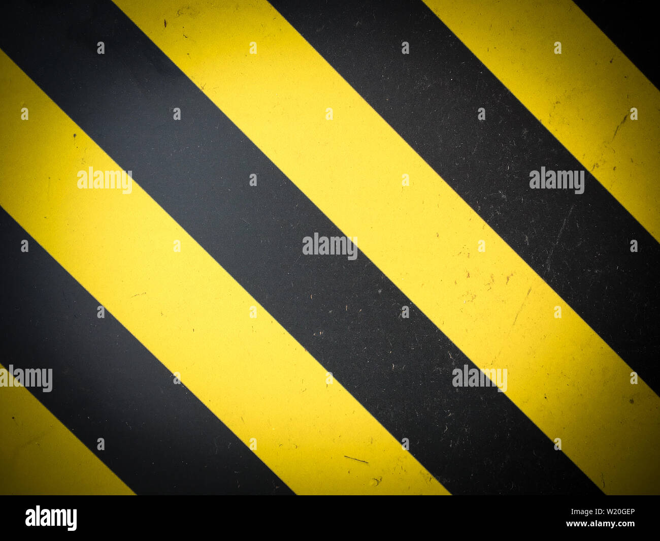 yellow black striped hazard warning background Stock Photo - Alamy