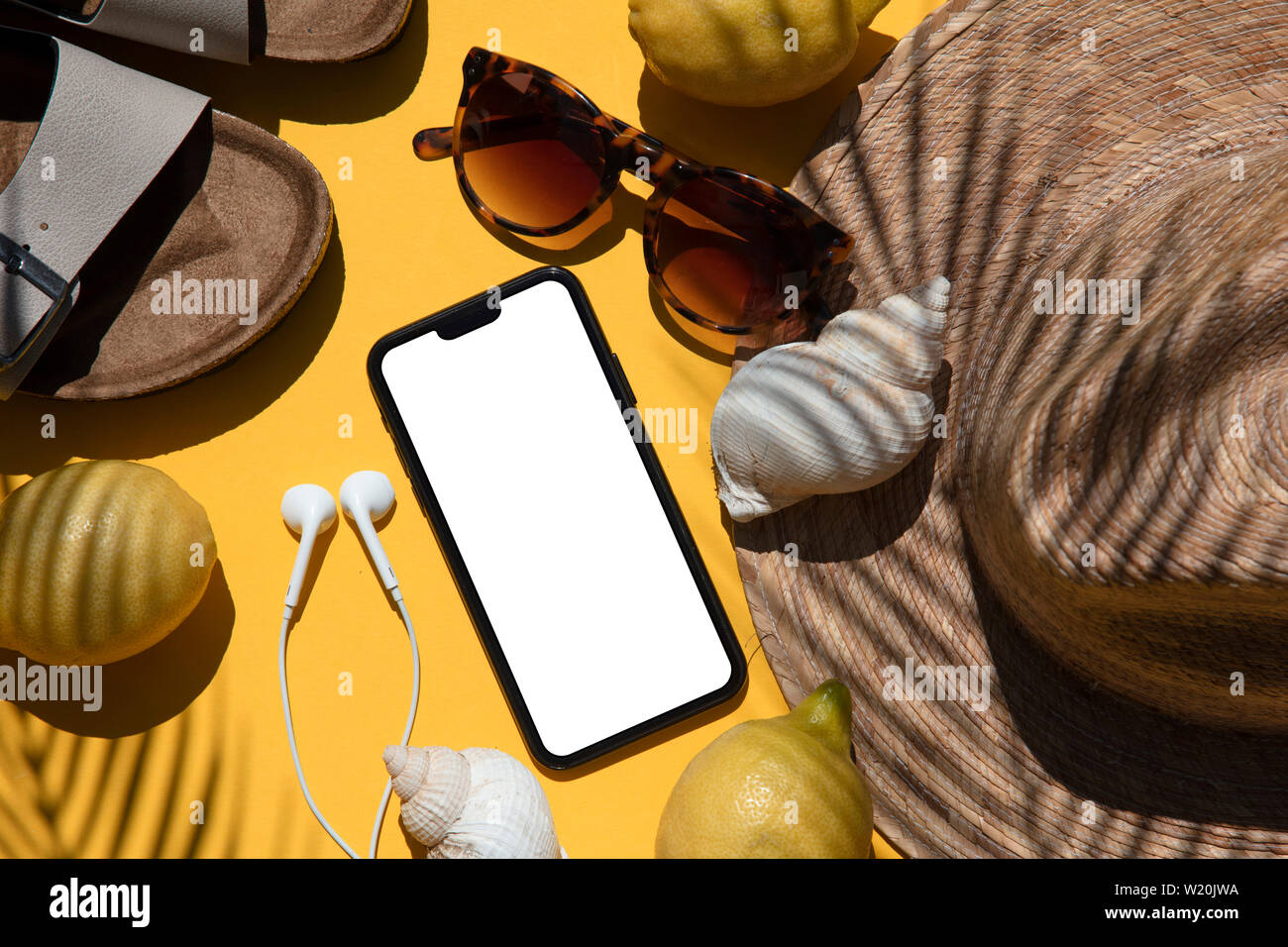 Summertime blank smartphone summer holiday composition Stock Photo - Alamy