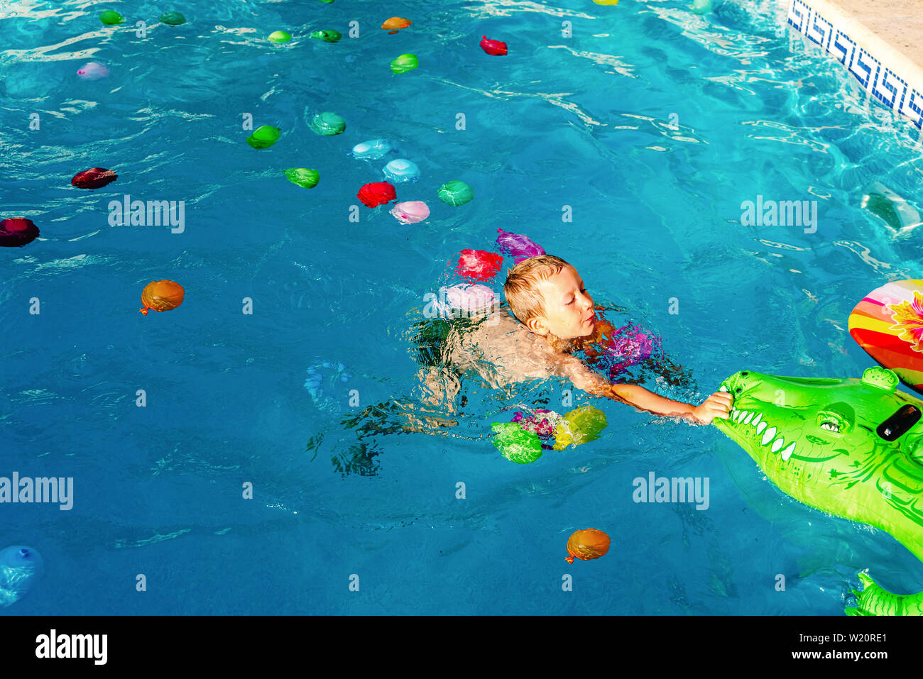 Throwing water balloon hi-res stock photography and images - Alamy