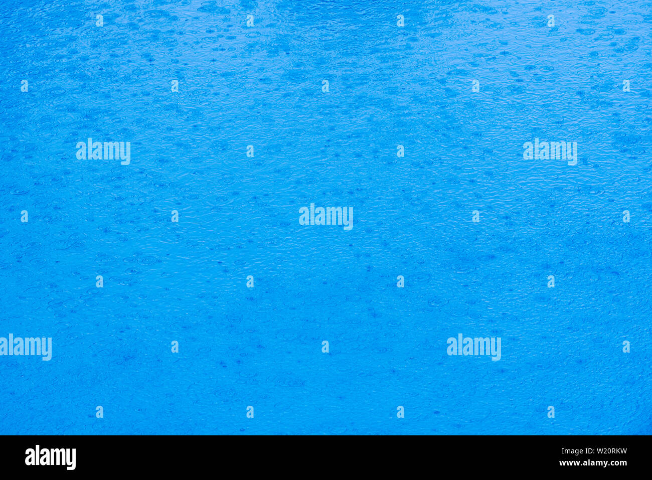 Image to use as background of rain falling on the water of a lake of ...