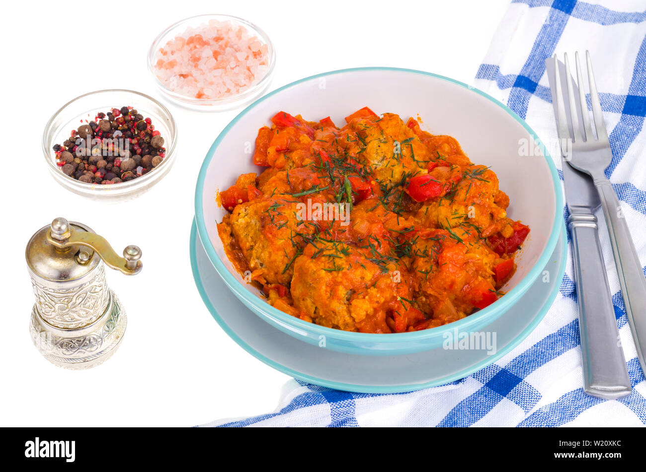 Meatballs meat, fish in tomato sauce with vegetables Stock Photo - Alamy