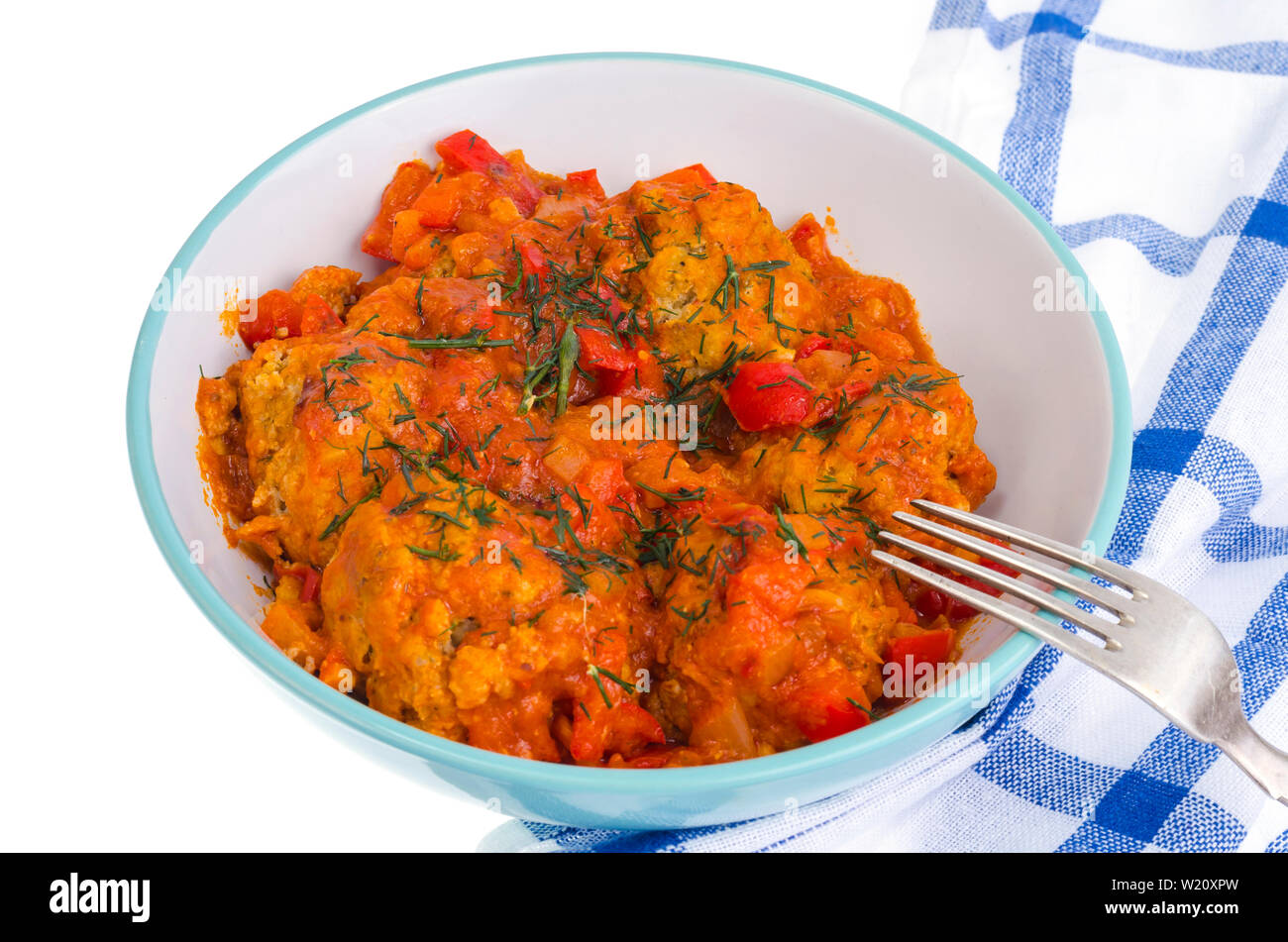 Meatballs meat, fish in tomato sauce with vegetables Stock Photo - Alamy