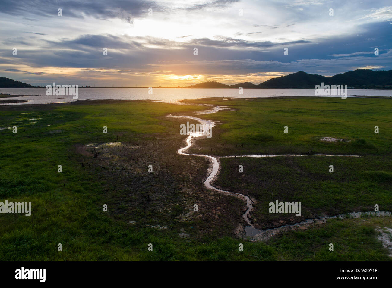 Aerial view landscape nature Water flow to river and grass background ...