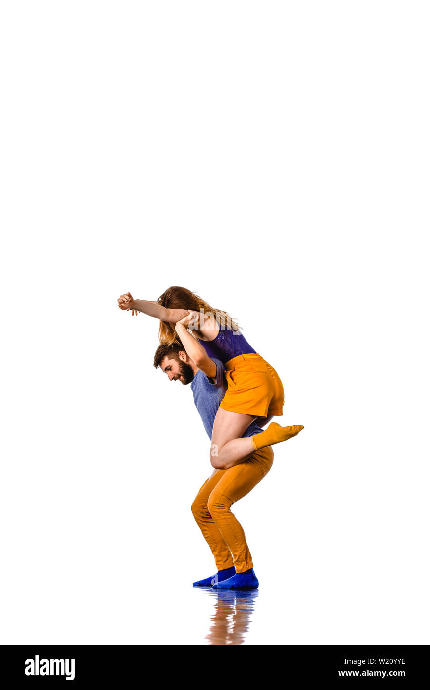 Two modern dancers couple woman and man dancing. Urban lifestyle. Hip ...
