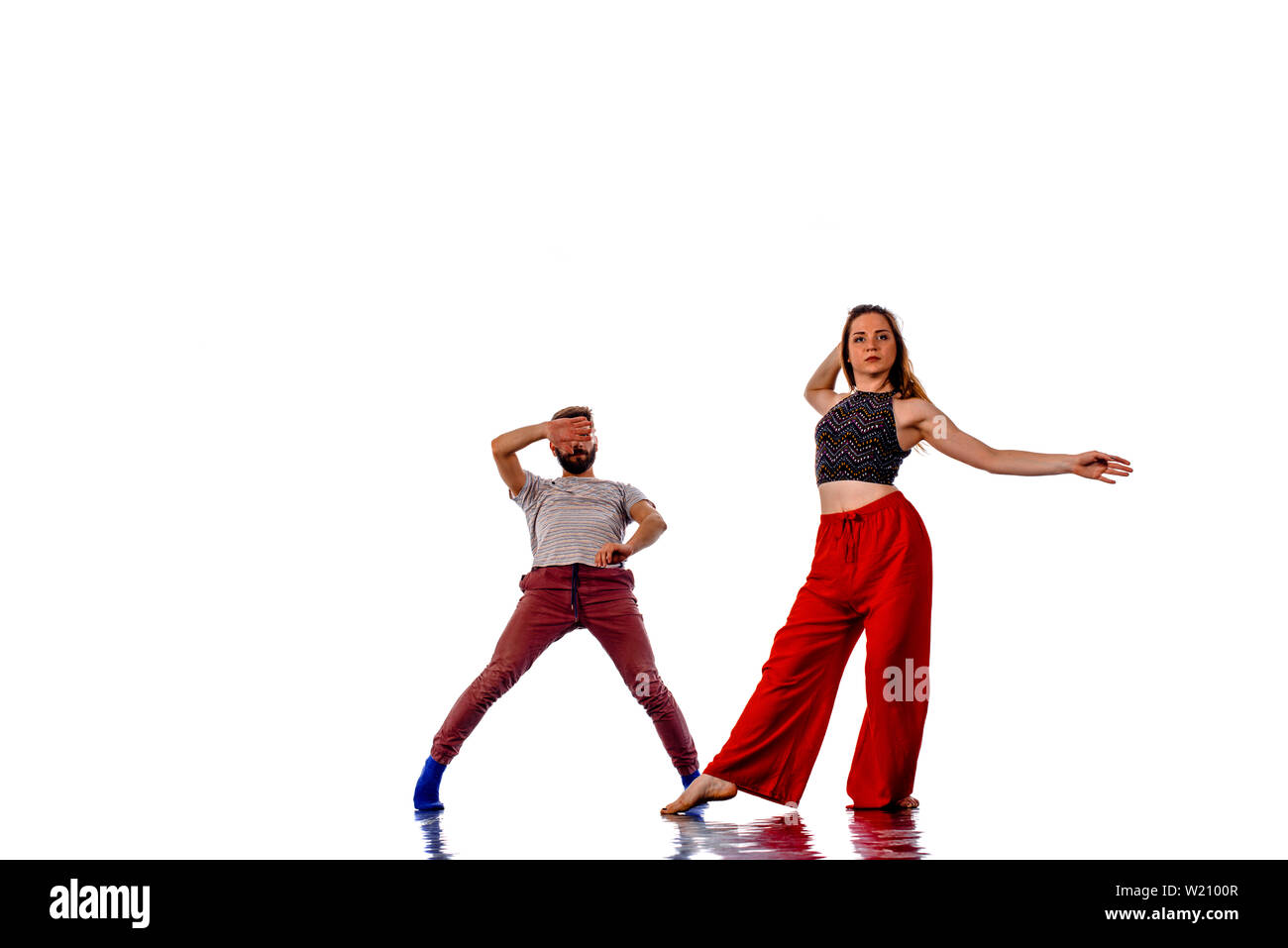 Ballet dancers in movement. Modern style dancers dancing contemporary ...