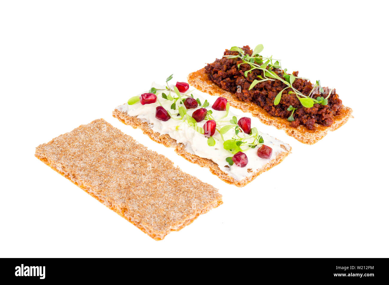 Healthy food. Rye crisps with young green sprouts Stock Photo - Alamy