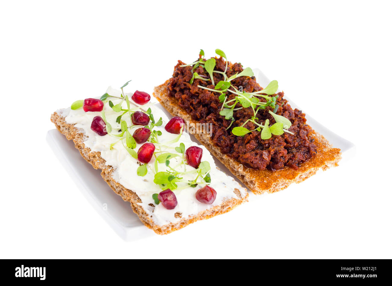 Healthy food. Rye crisps with young green sprouts Stock Photo - Alamy