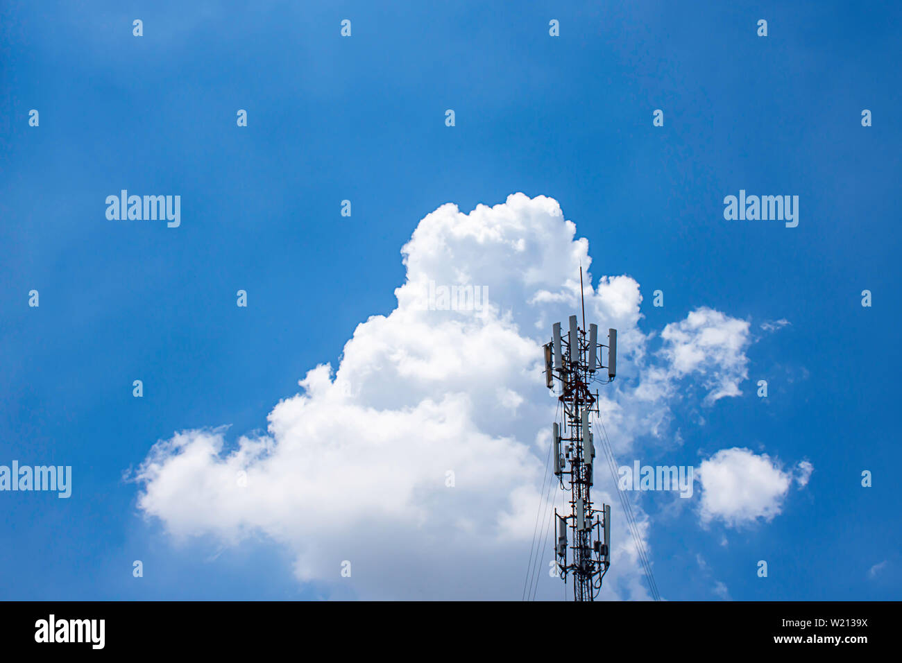 Wave transmission mast large phone signal with a bright blue sky Stock ...