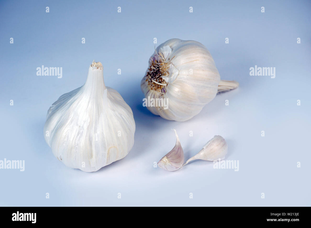 healthy organic fresh garlic on white background and happy smile Stock ...