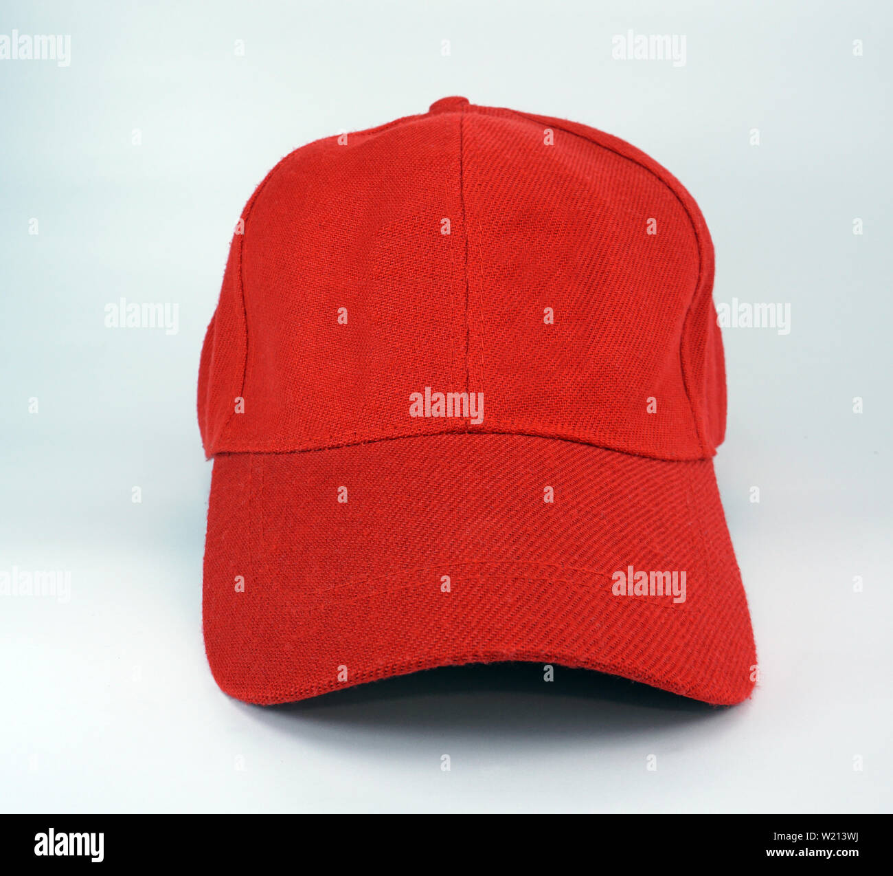 Red, blue, pink Cap on white background Smiley Stock Photo - Alamy