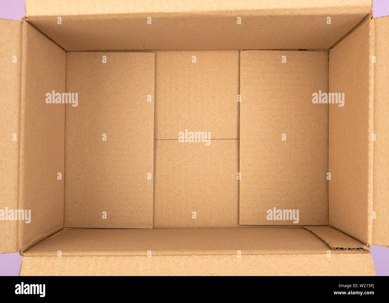 bottom of open empty brown cardboard box, top view Stock Photo - Alamy