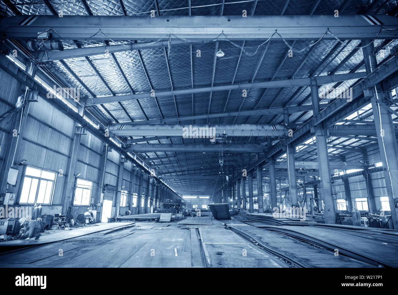 In the steel structure production workshop, workers are working Stock ...