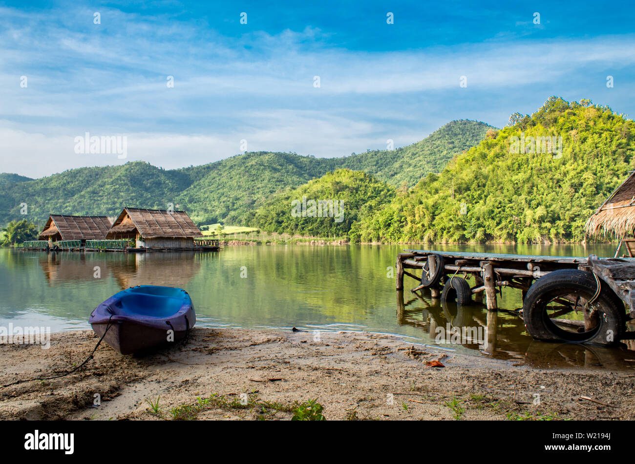 The wooden raft and Kayak in the water reservoirs and mountain views ...