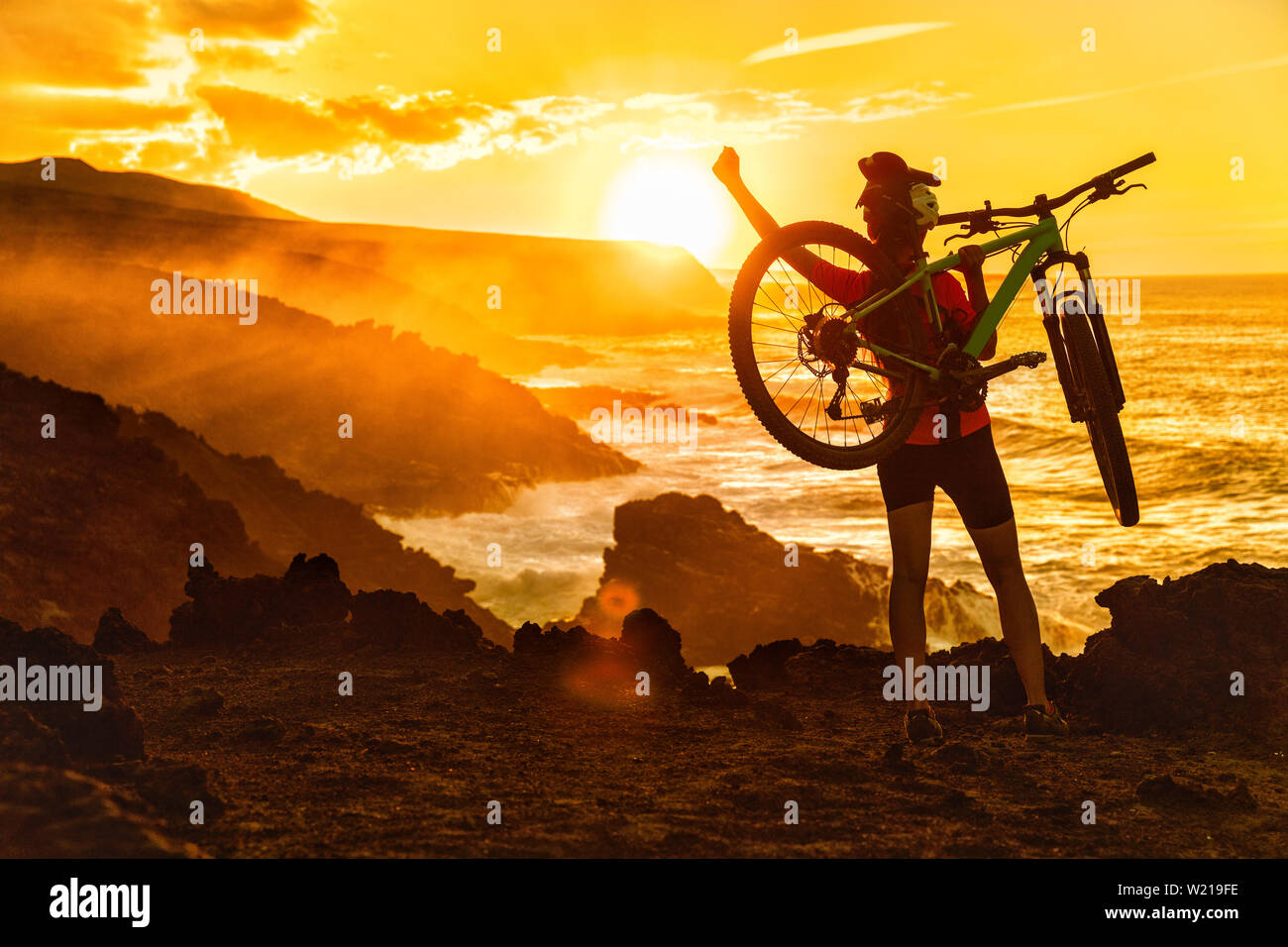 Success, achievement, accomplishment and winning concept with cyclist ...