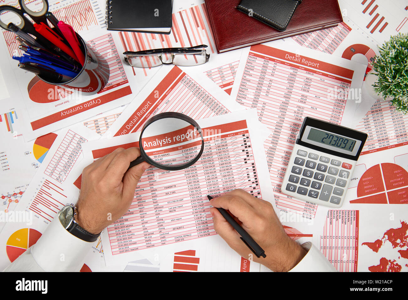 Business reports, blank paper sheet, data tables and charts - directly ...