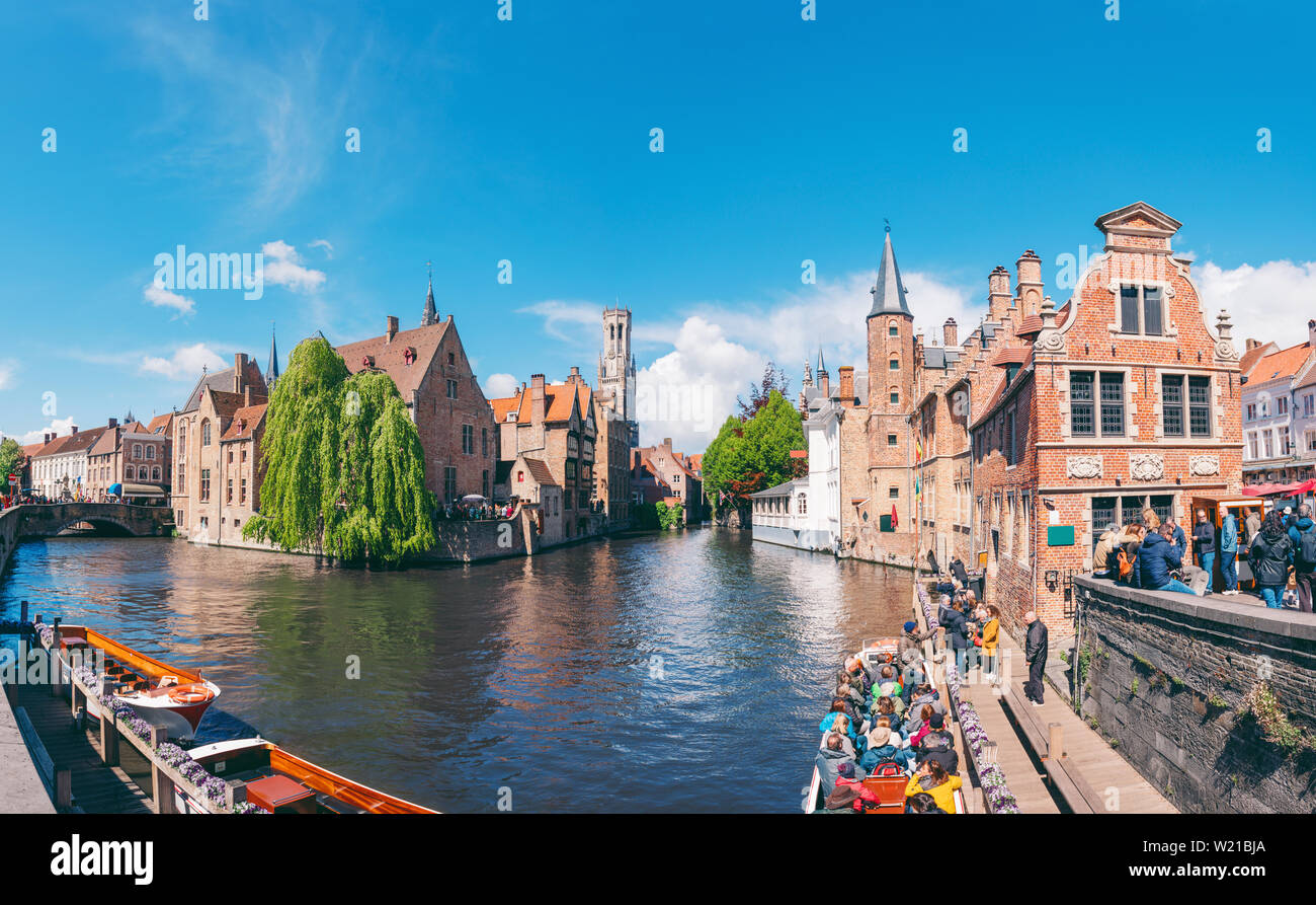 Panoramic city view with Belfry tower and famous canal in Bruges ...