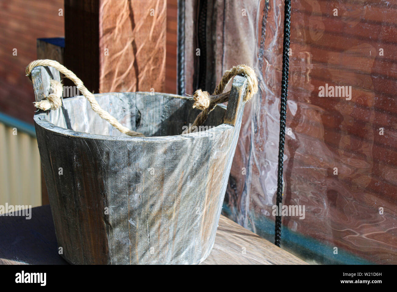 Wooden bucket rustic Stock Photo - Alamy