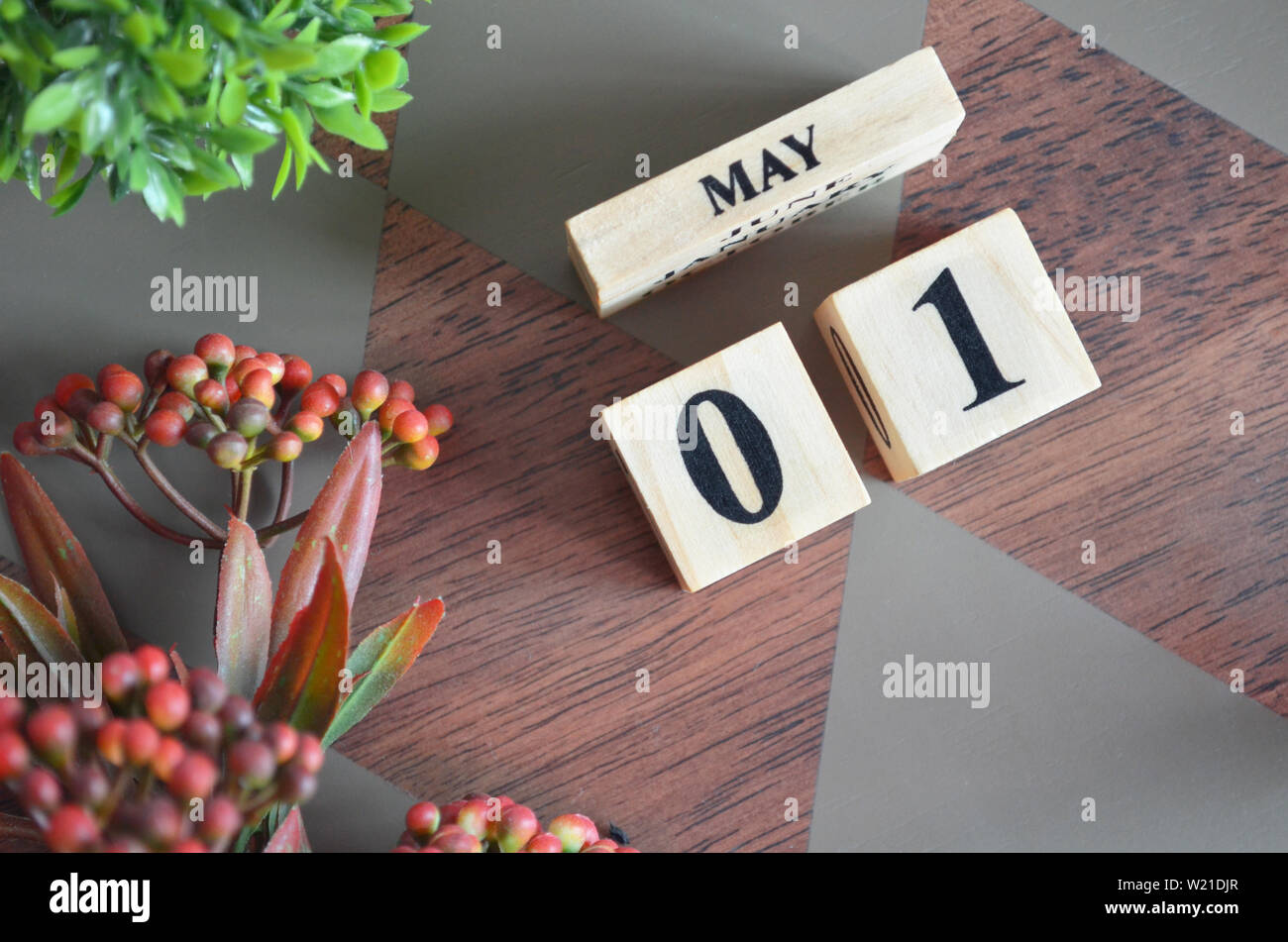 Date of May month. Diamond wood table for background Stock Photo - Alamy