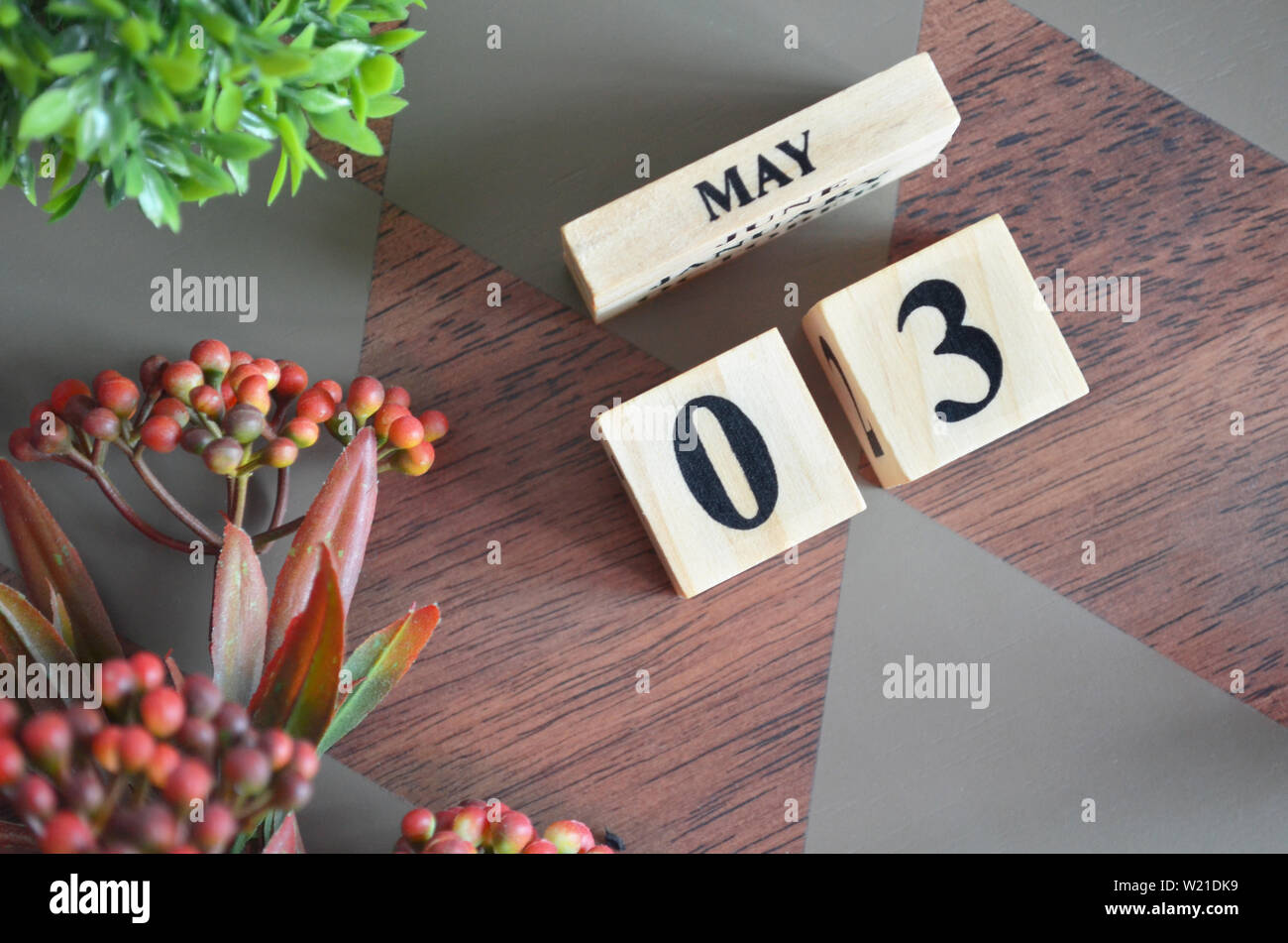 Date of May month. Diamond wood table for background Stock Photo - Alamy