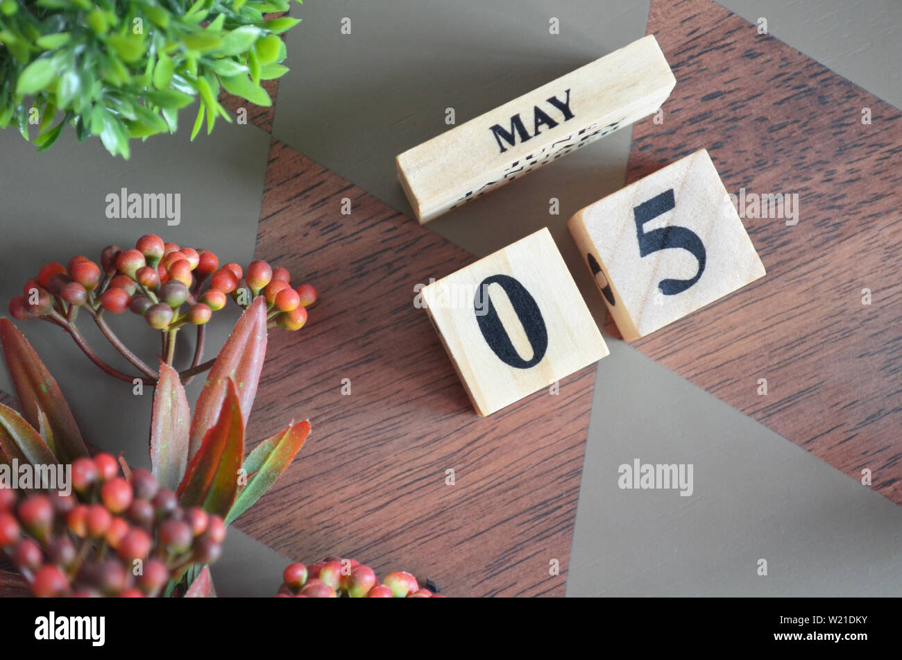 Date of May month. Diamond wood table for background Stock Photo - Alamy