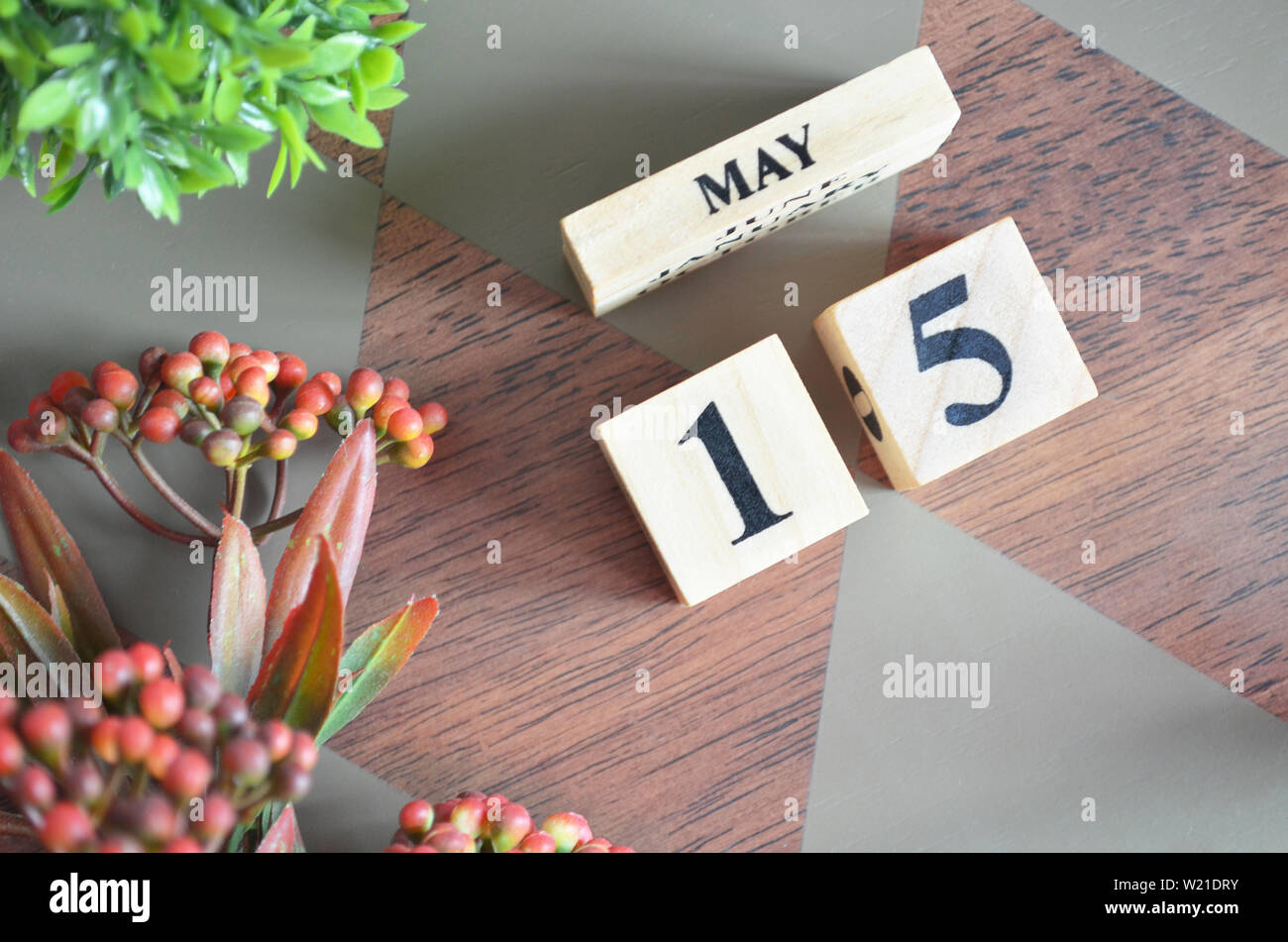 Date of May month. Diamond wood table for background Stock Photo - Alamy