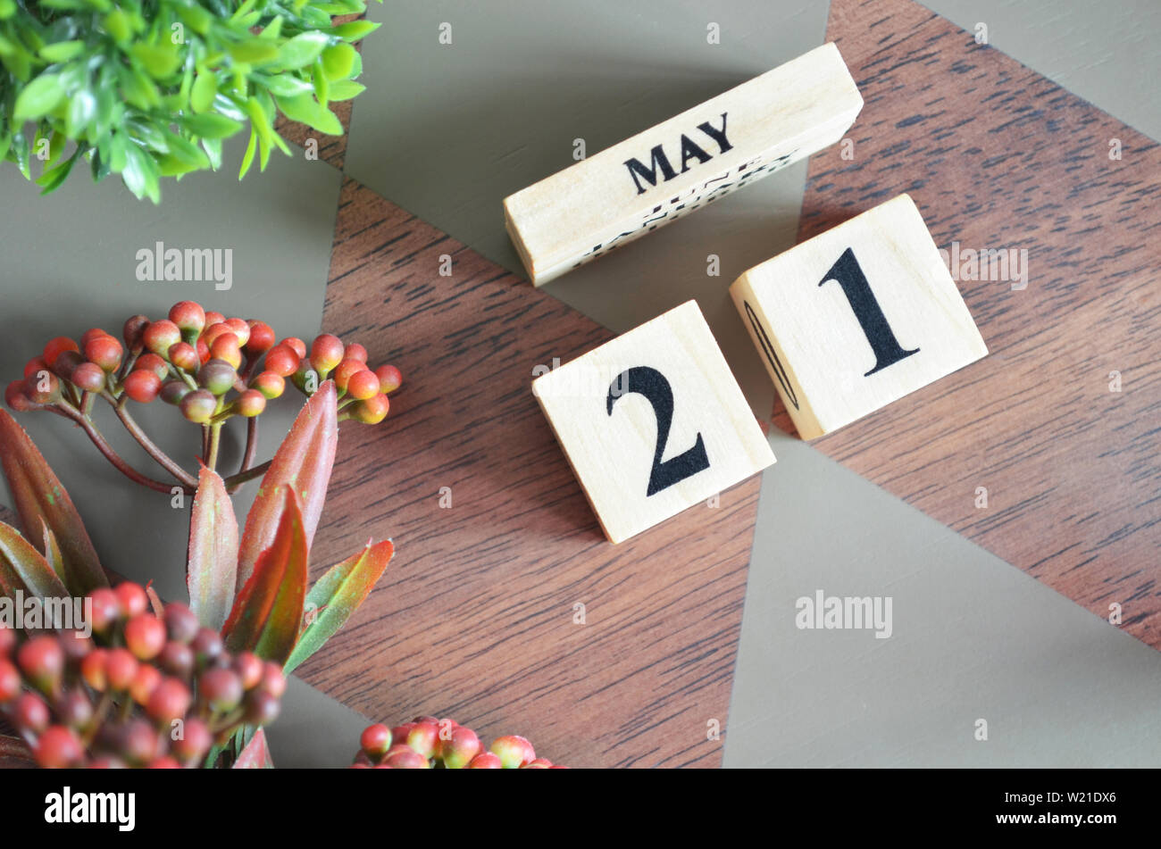 Date of May month. Diamond wood table for background Stock Photo - Alamy