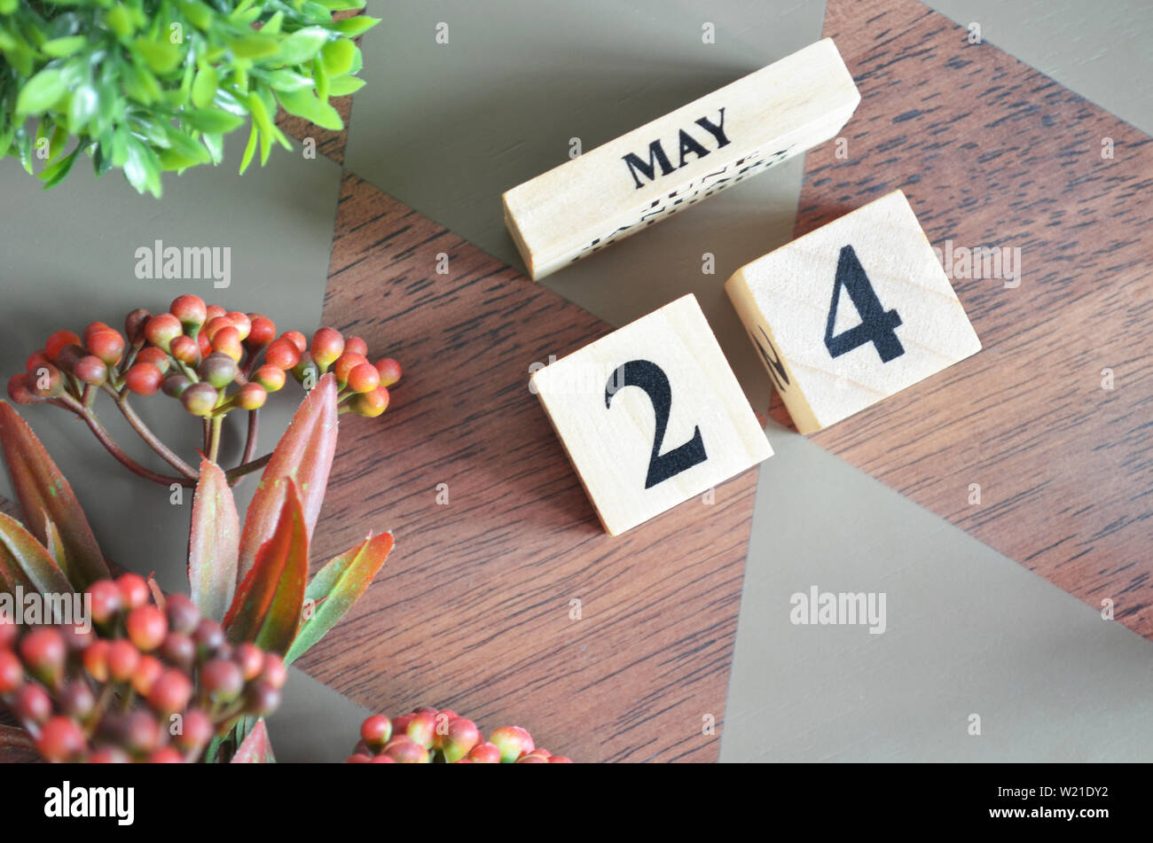 Date of May month. Diamond wood table for background Stock Photo - Alamy