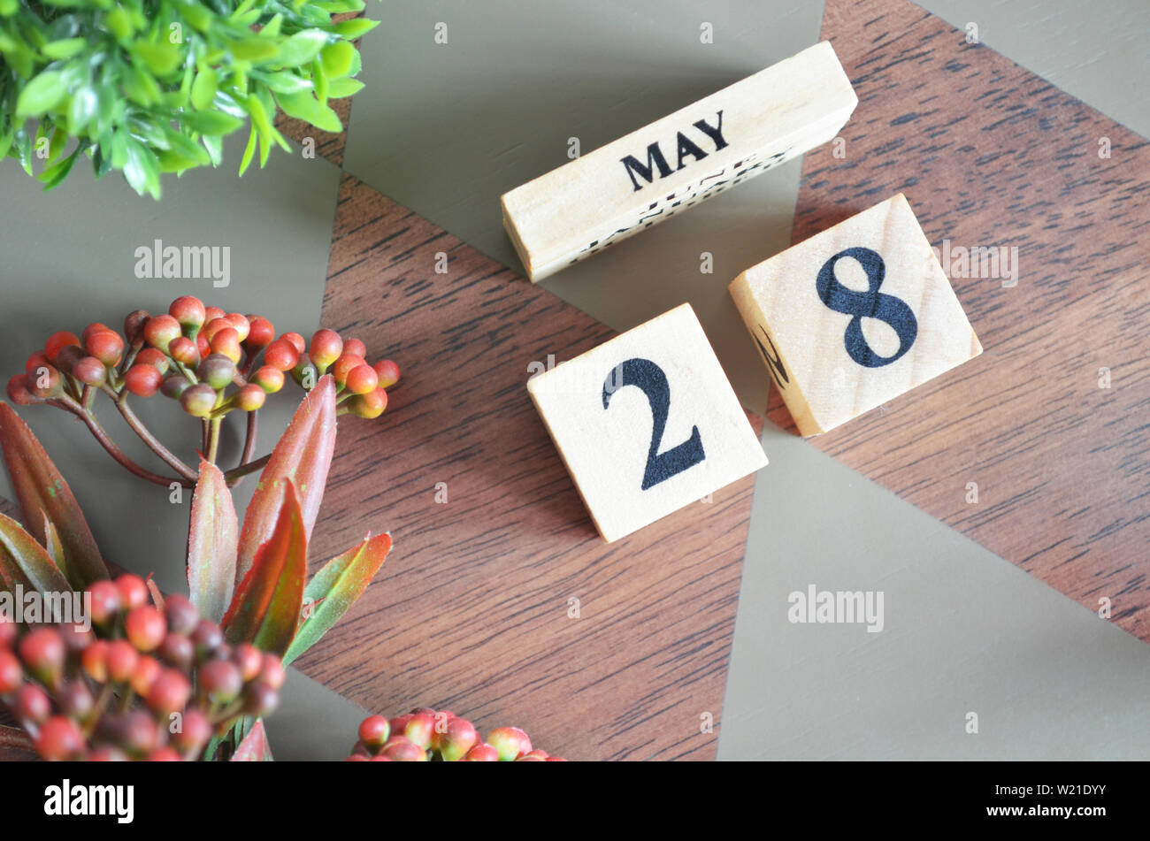Date of May month. Diamond wood table for background Stock Photo - Alamy
