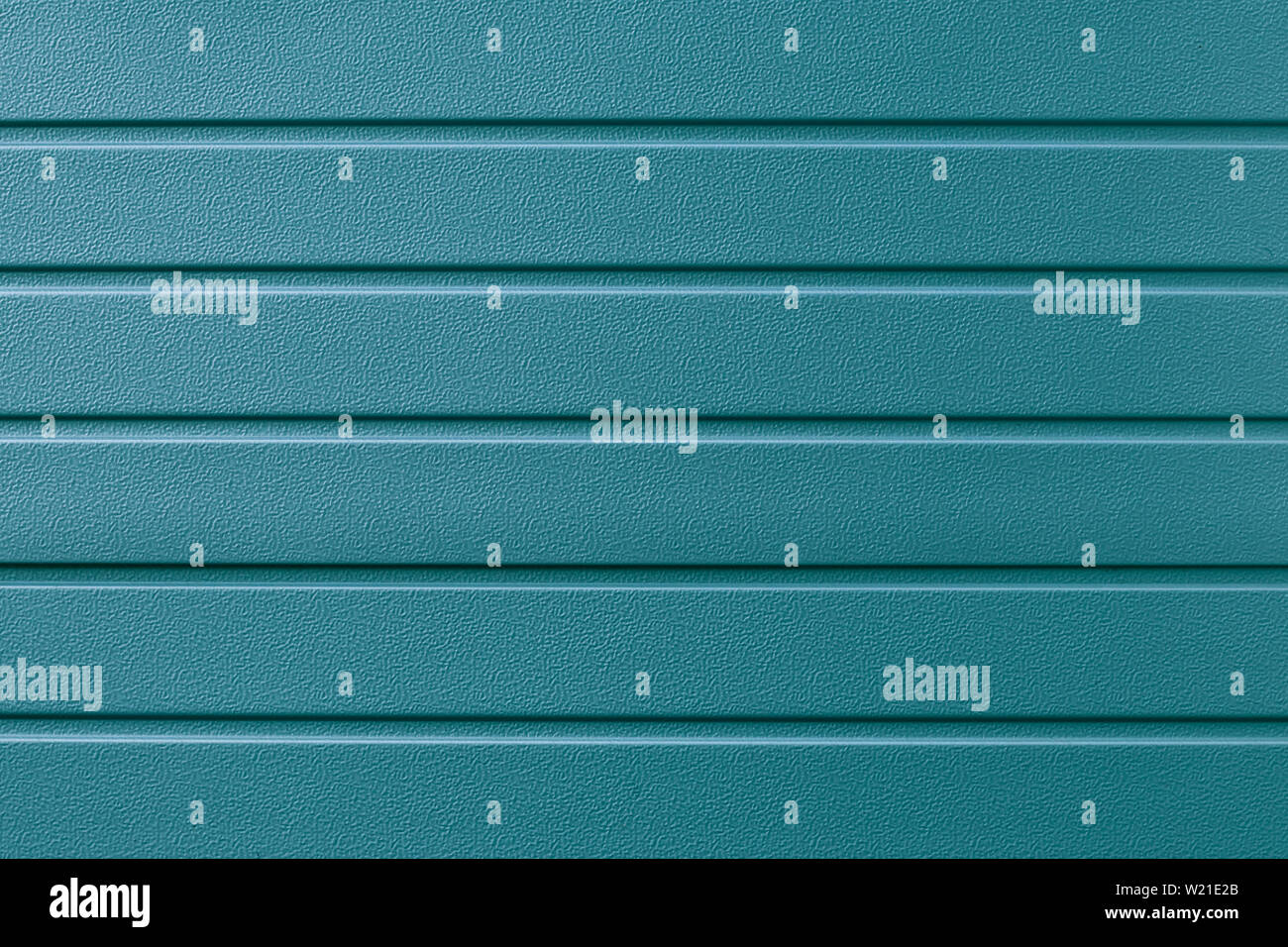Turquoise metallic striped surface. Metalline wall siding, cladding ...