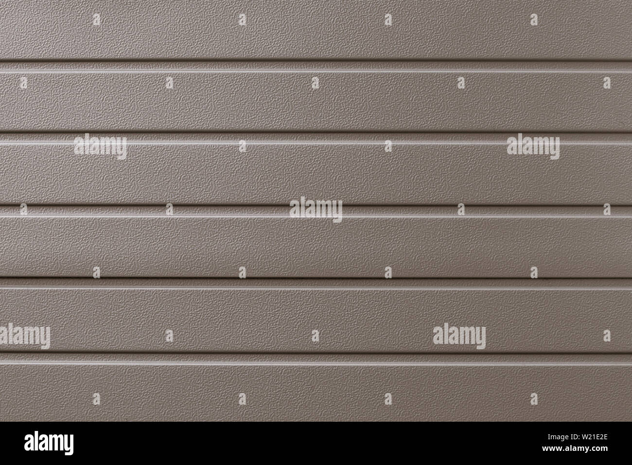 Light brown metallic ribbed surface. Abstract pattern. Beige metal ...