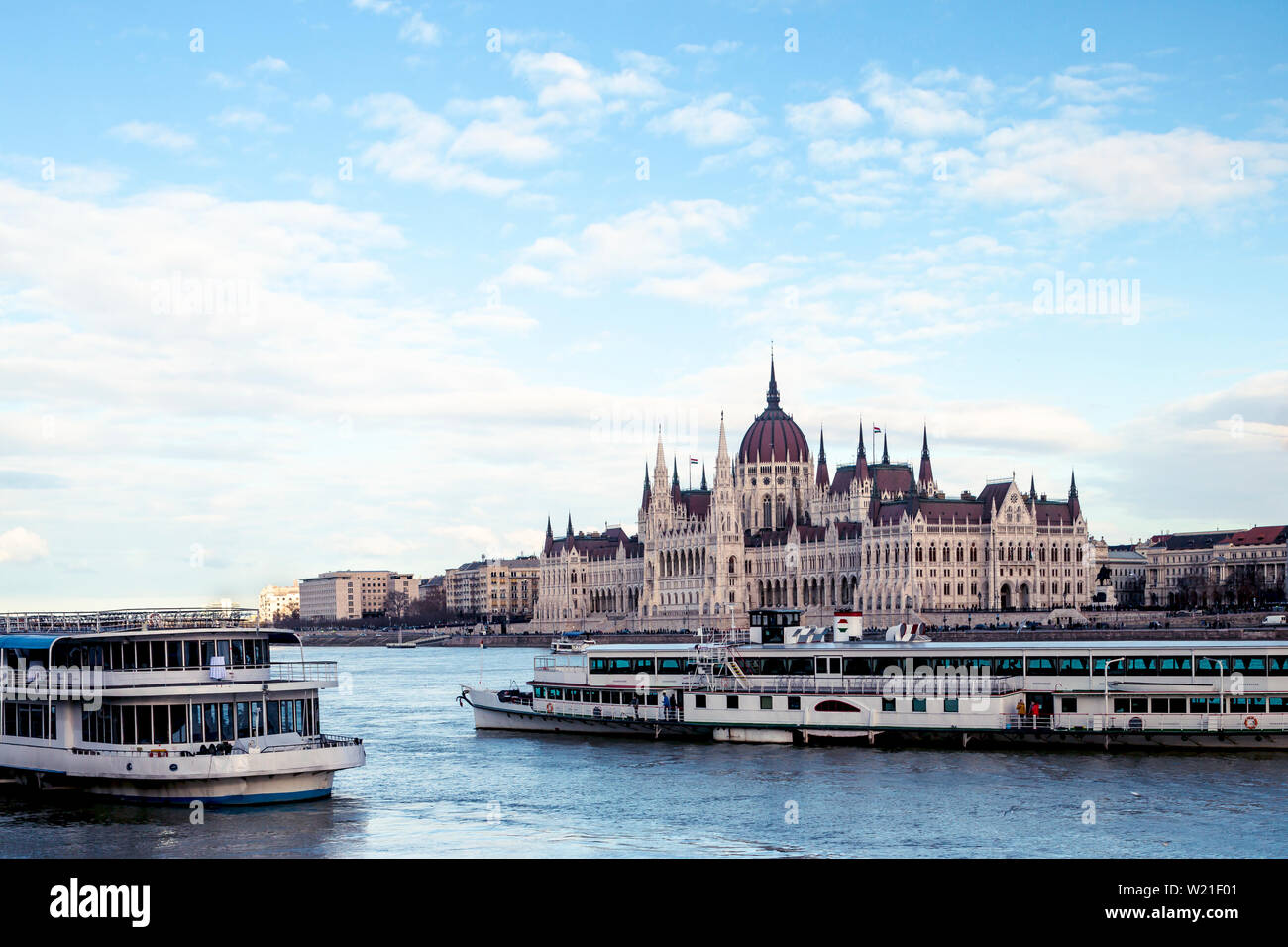 Cityscape of Budapest with bright parliament and Danube river with ...