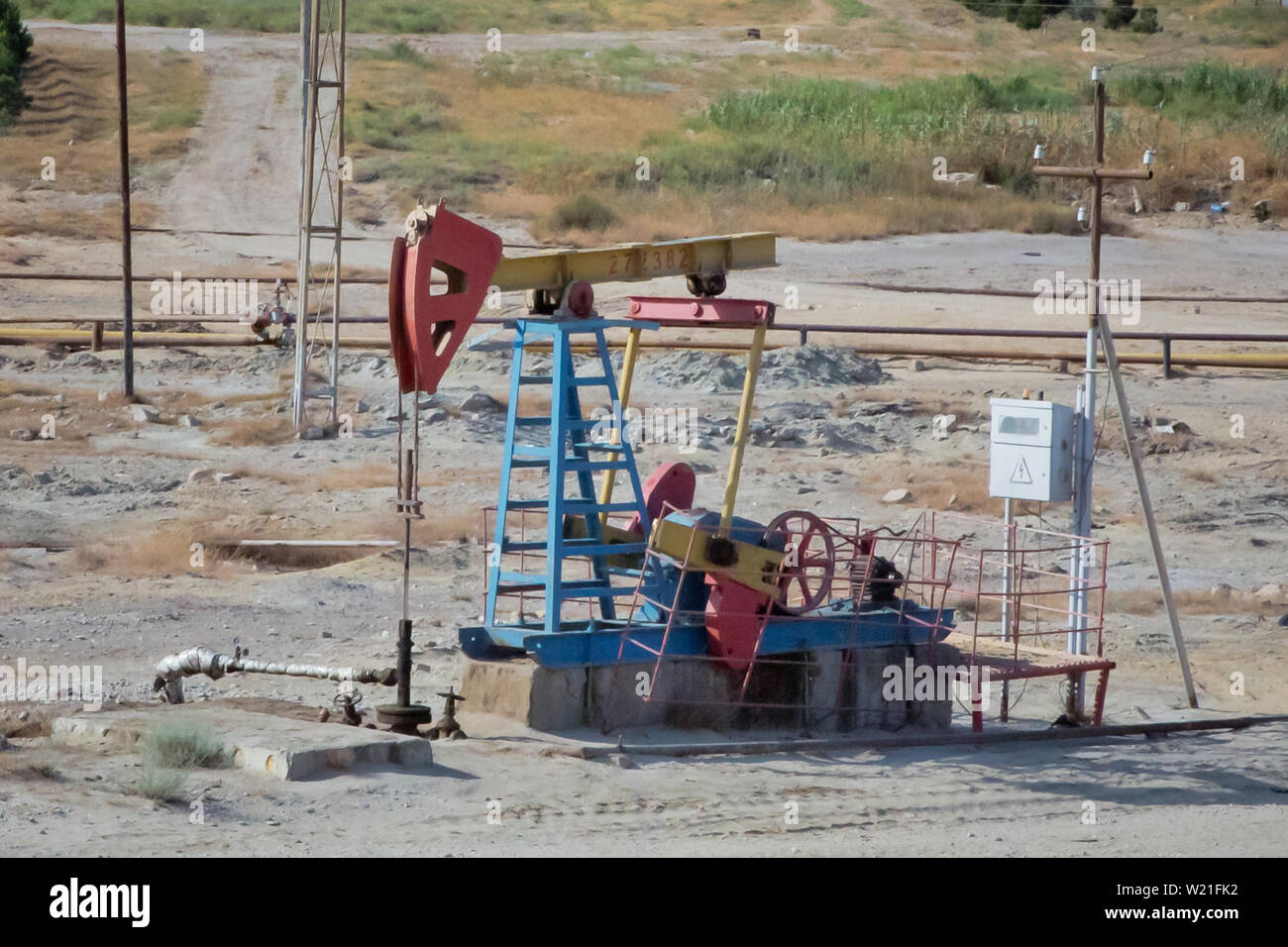 Pumping unit is working in oil field .Beam type crank balance pumping ...