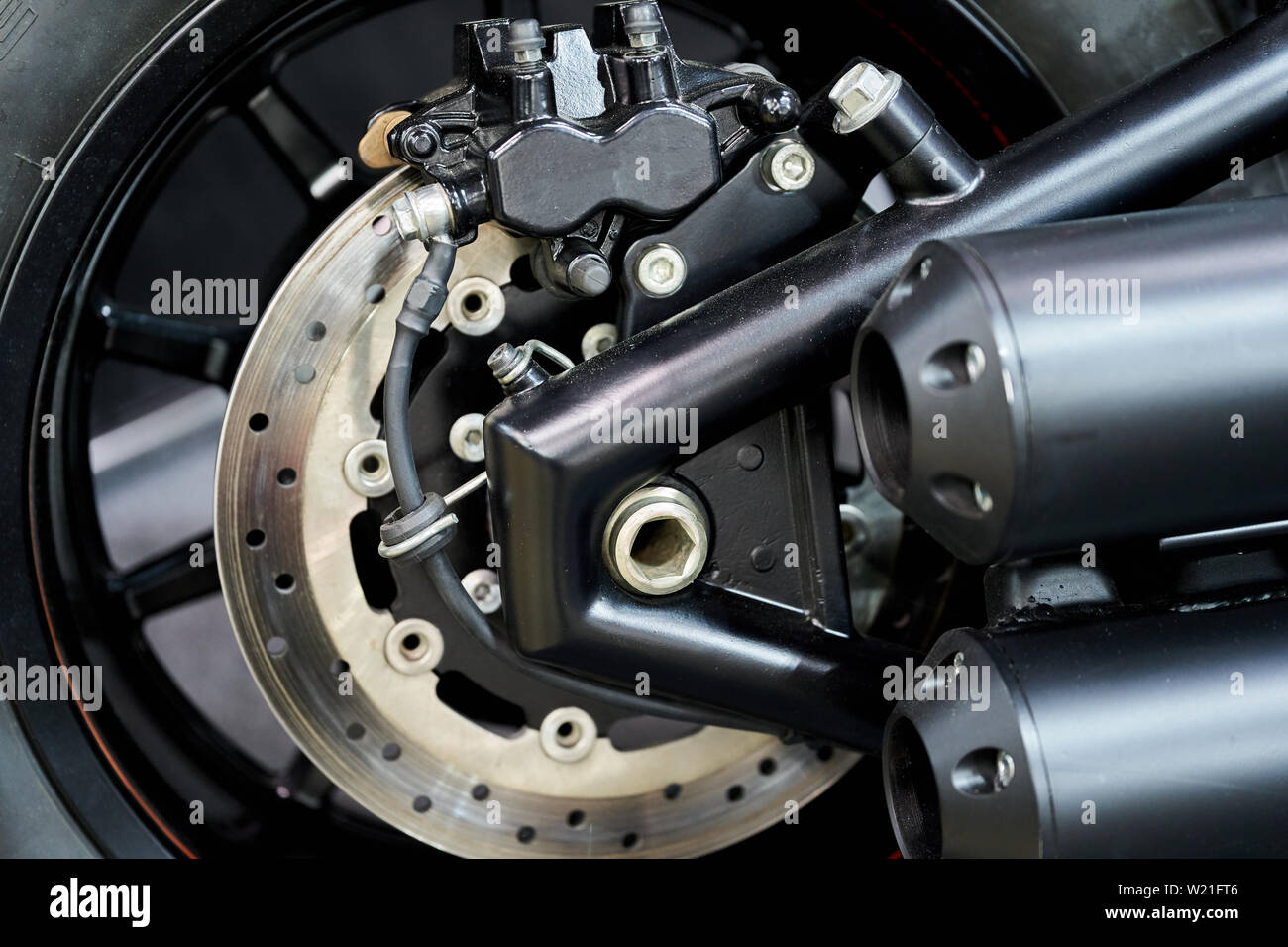 The rear wheel of a modern motorcycle Stock Photo - Alamy