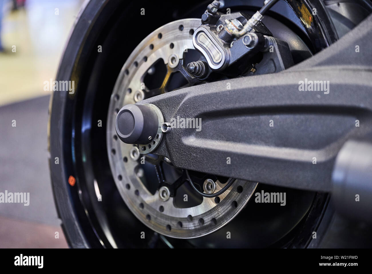 The rear wheel of a modern motorcycle Stock Photo - Alamy