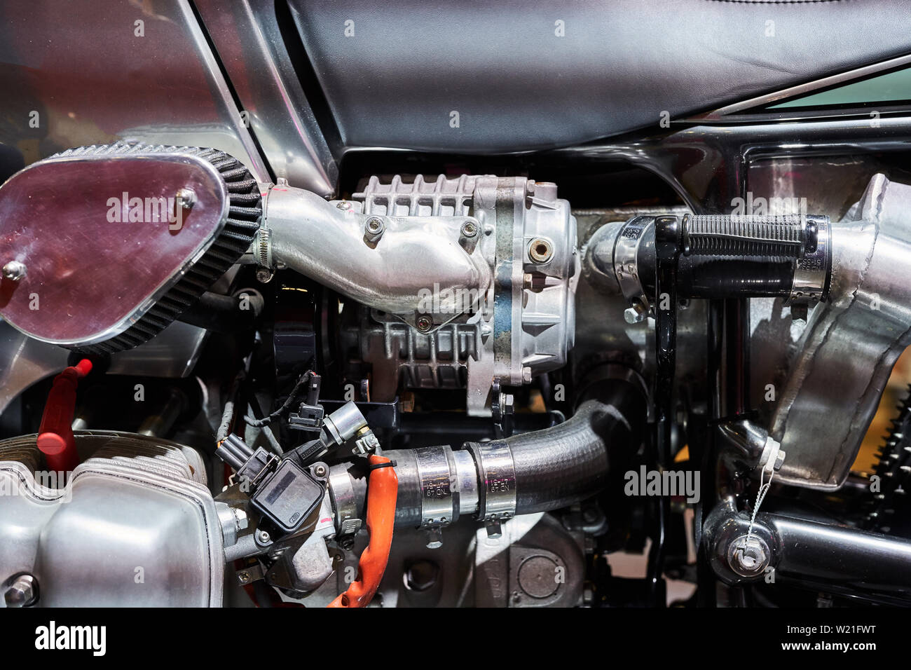 The powerful engine of a modern motorcycle closeup. The layout of the ...