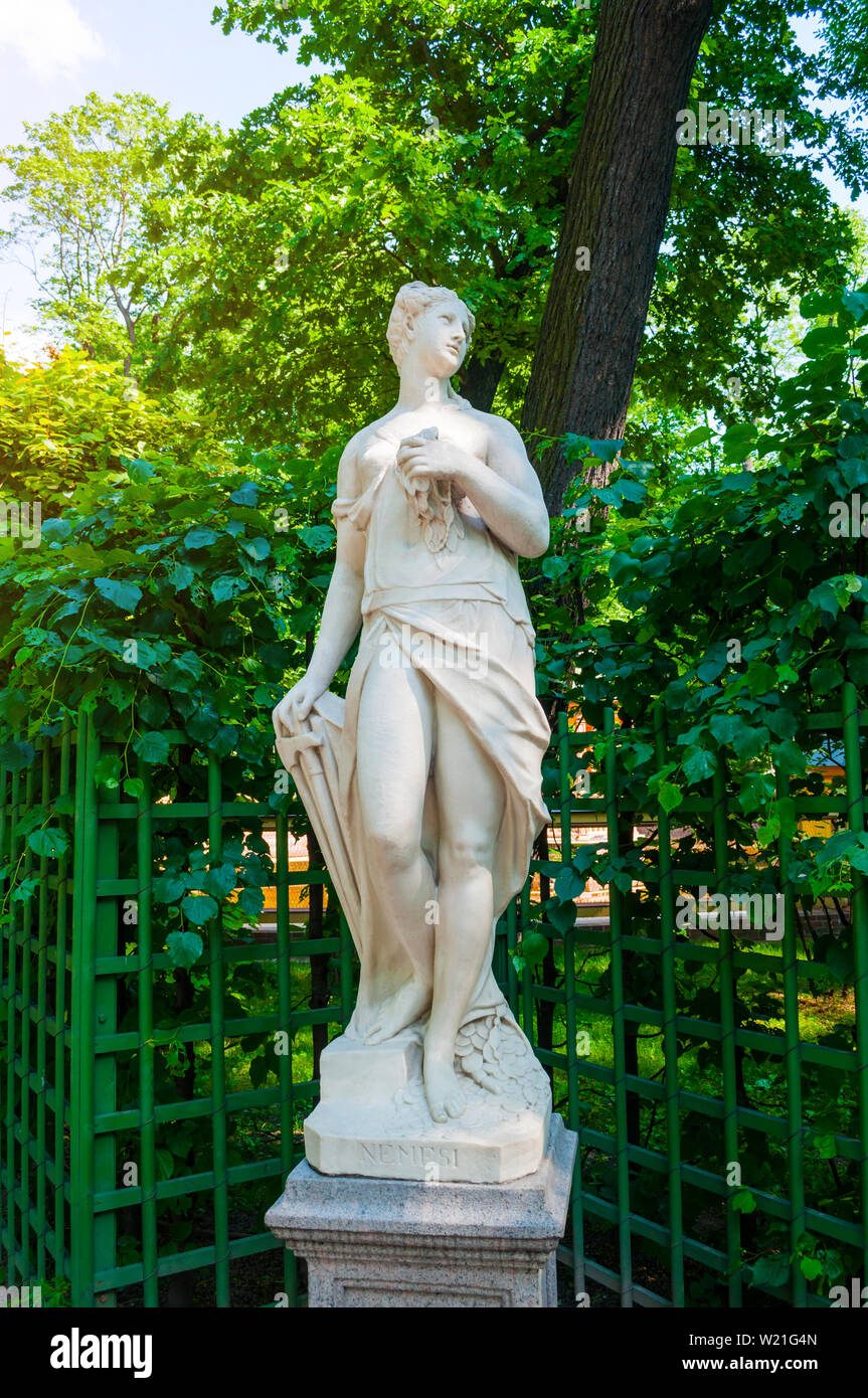 Summer garden in St Petersburg, Russia. The sculpture of Nemesis - the ...
