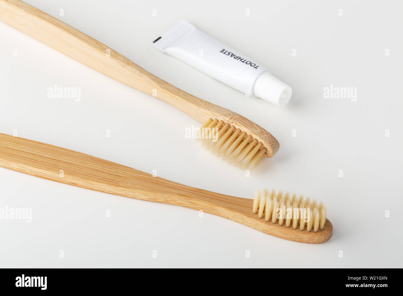 Toothbrushes with toothpaste, travel size, on white background Stock ...