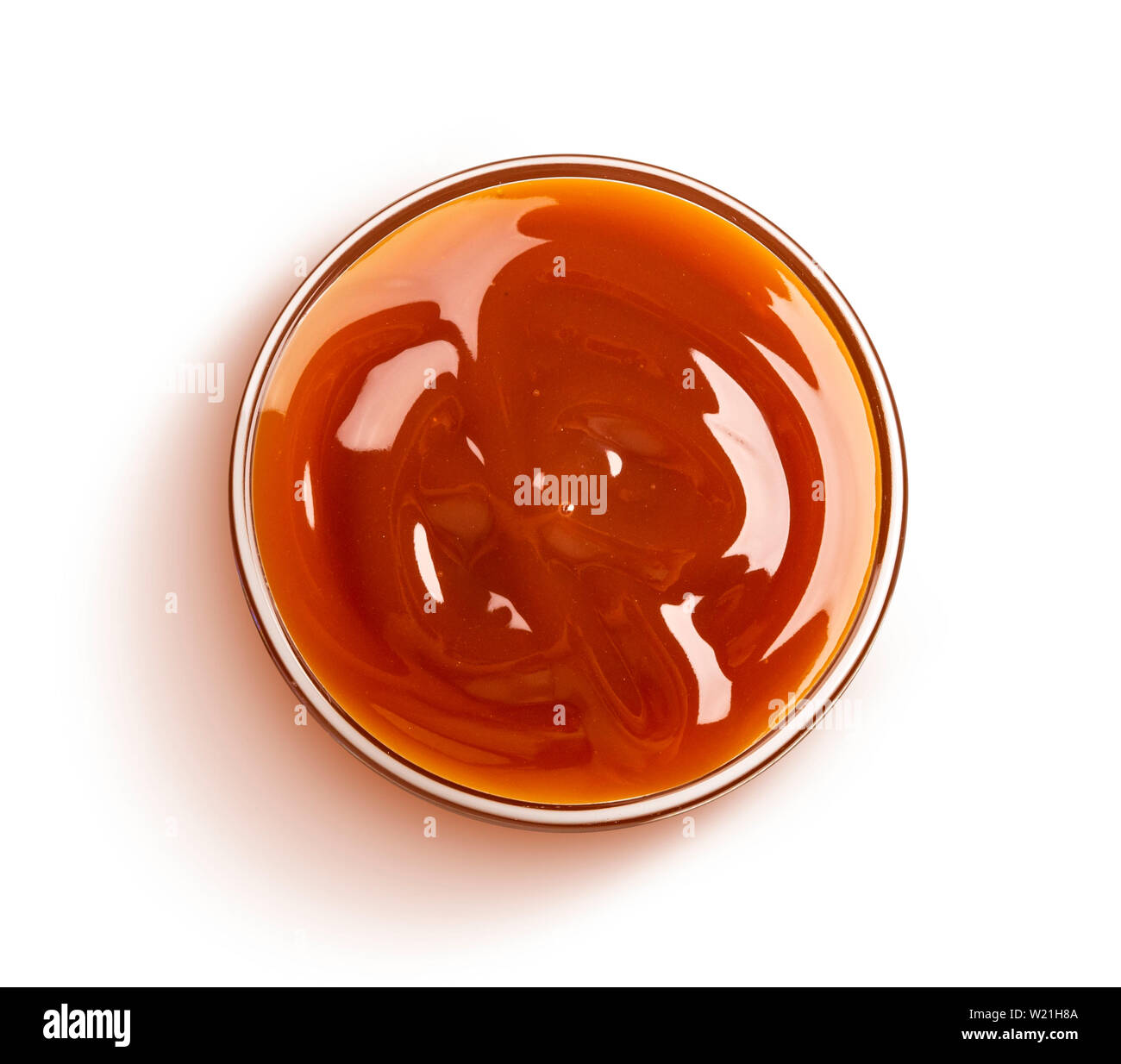 Caramel sauce isolated on white background with clipping path, top view ...