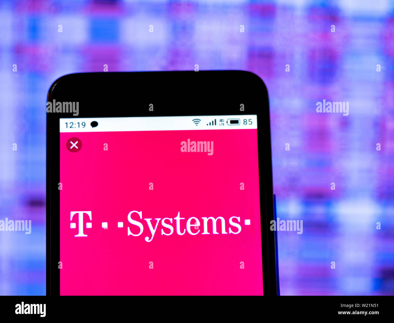 In this photo illustration the T-Systems logo is seen displayed on a ...