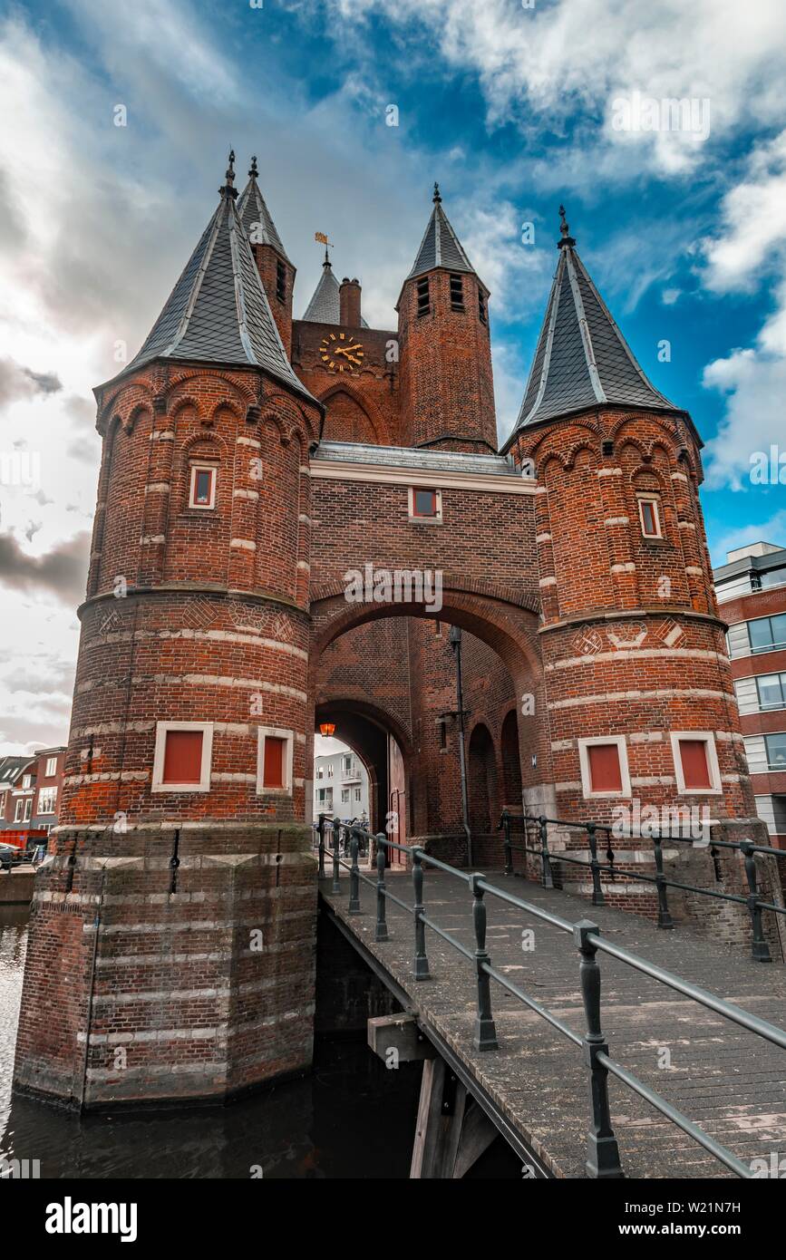 Bridge with Amsterdamse Poort city gate, Haarlem, North Holland ...