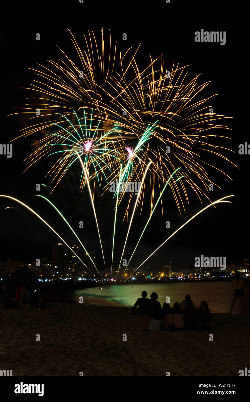 Beautiful firework in a small Spanish town Palamos, day of celebrating ...