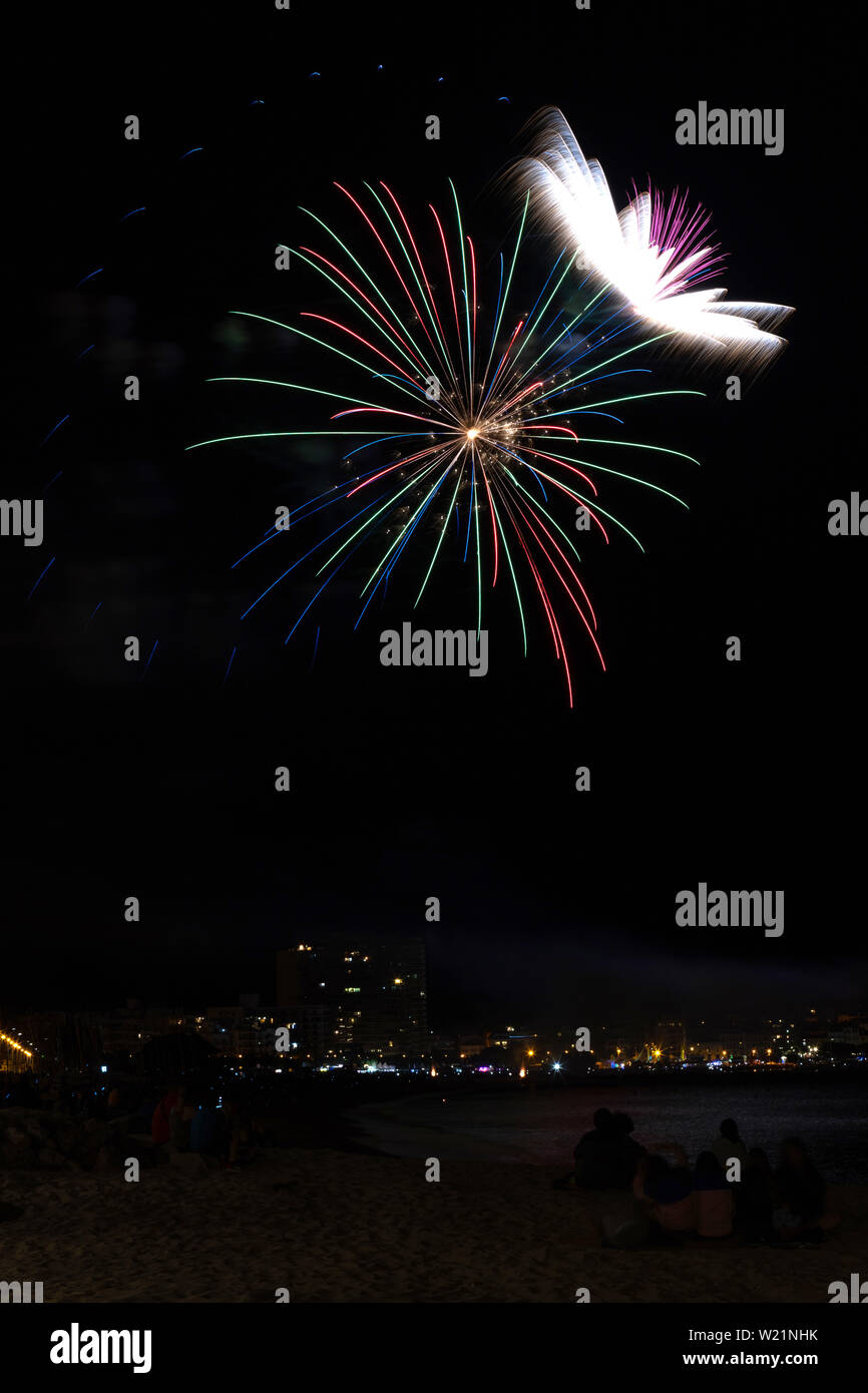 Beautiful firework in a small Spanish town Palamos, day of celebrating ...