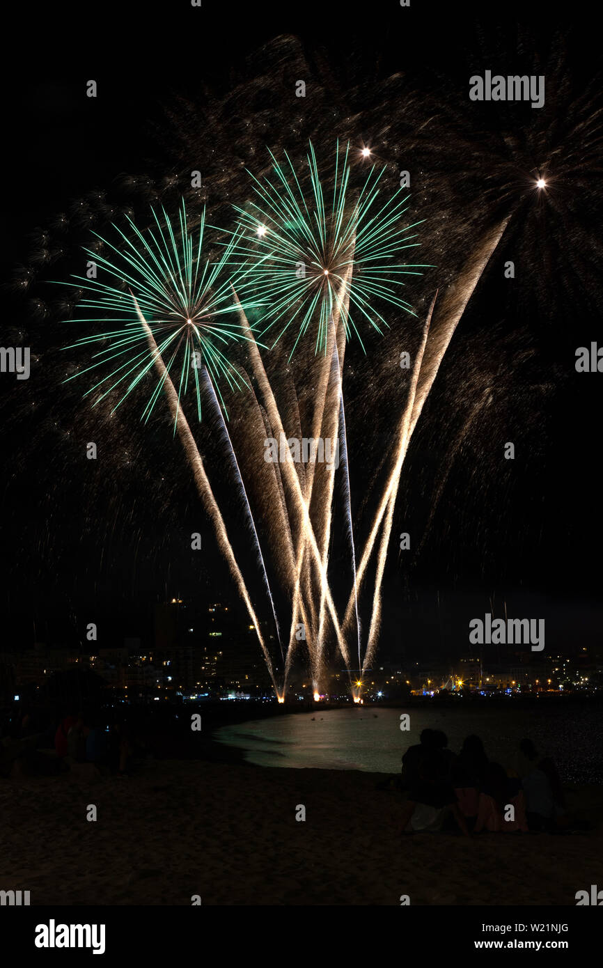 Beautiful firework in a small Spanish town Palamos, day of celebrating ...