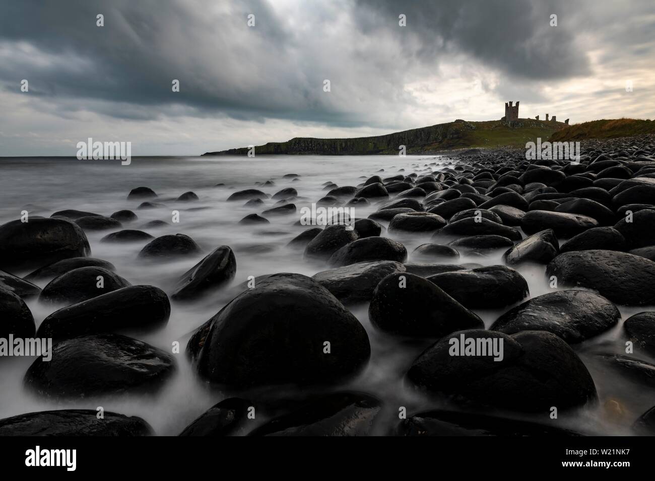 Dark black coastal rocks hi-res stock photography and images - Alamy