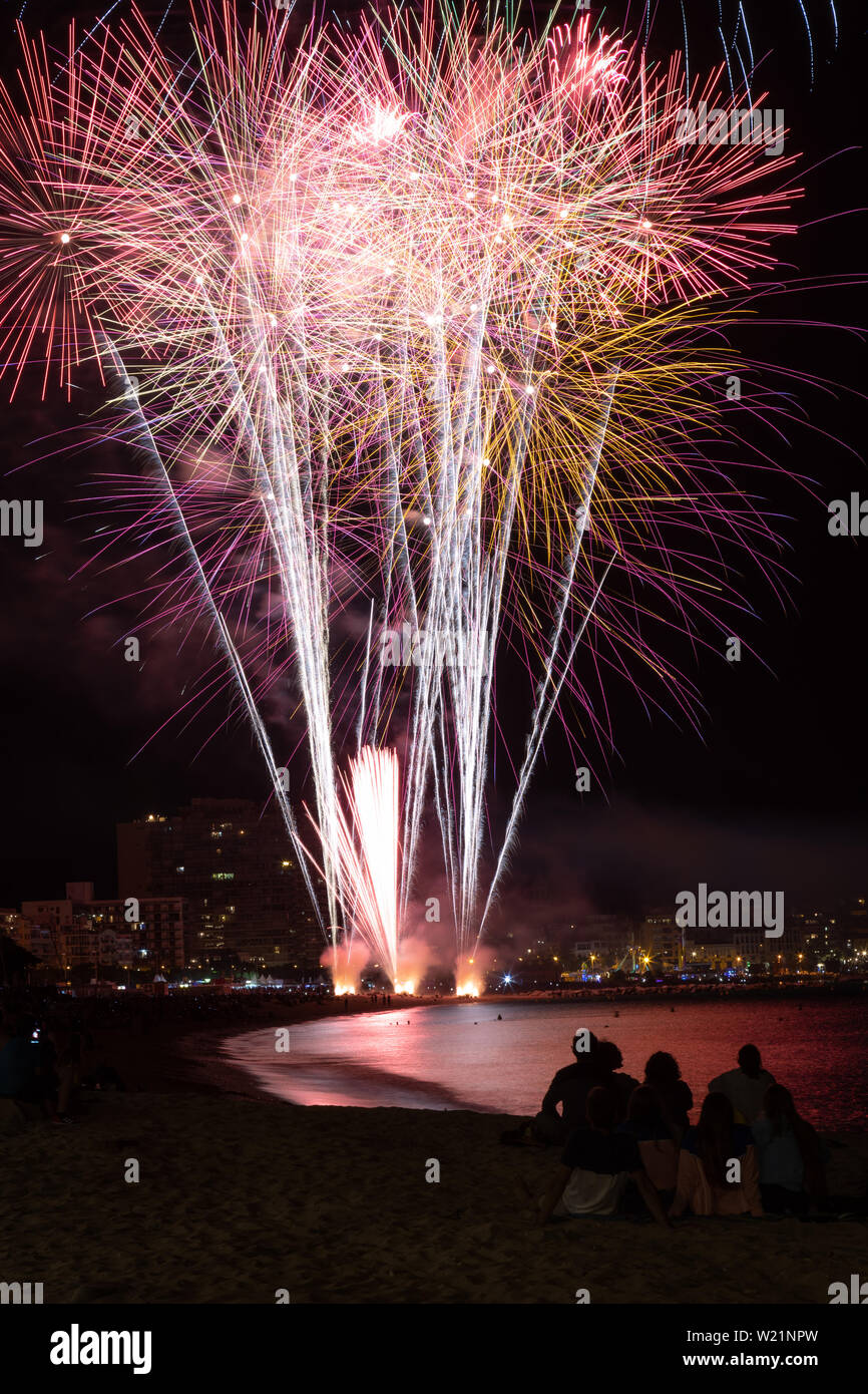 Beautiful firework in a small Spanish town Palamos, day of celebrating ...