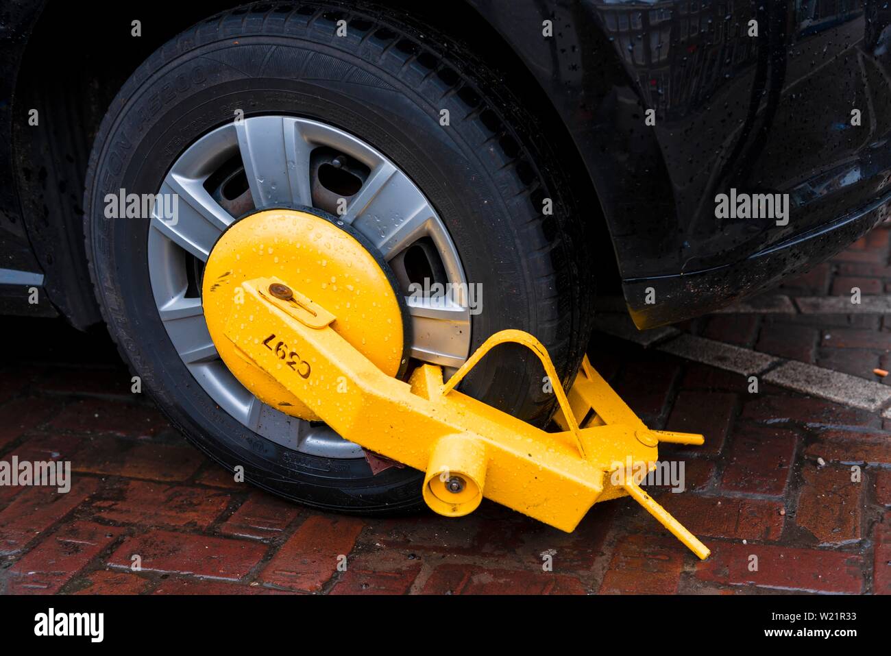 Tyre clamp hi-res stock photography and images - Alamy
