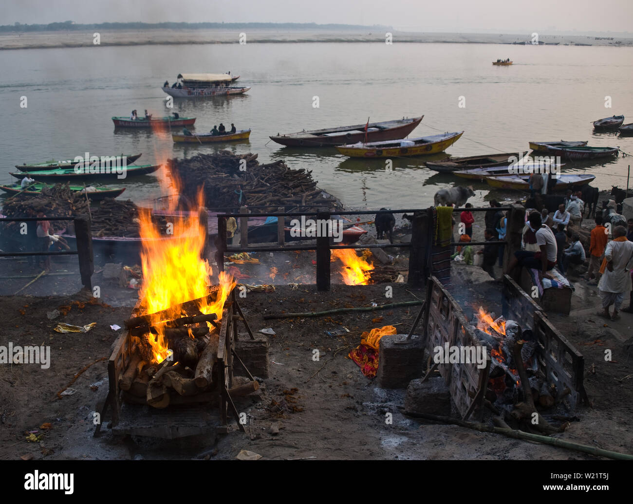 Manikarnika ghat cremation ground + Ganges river ( India Stock Photo ...