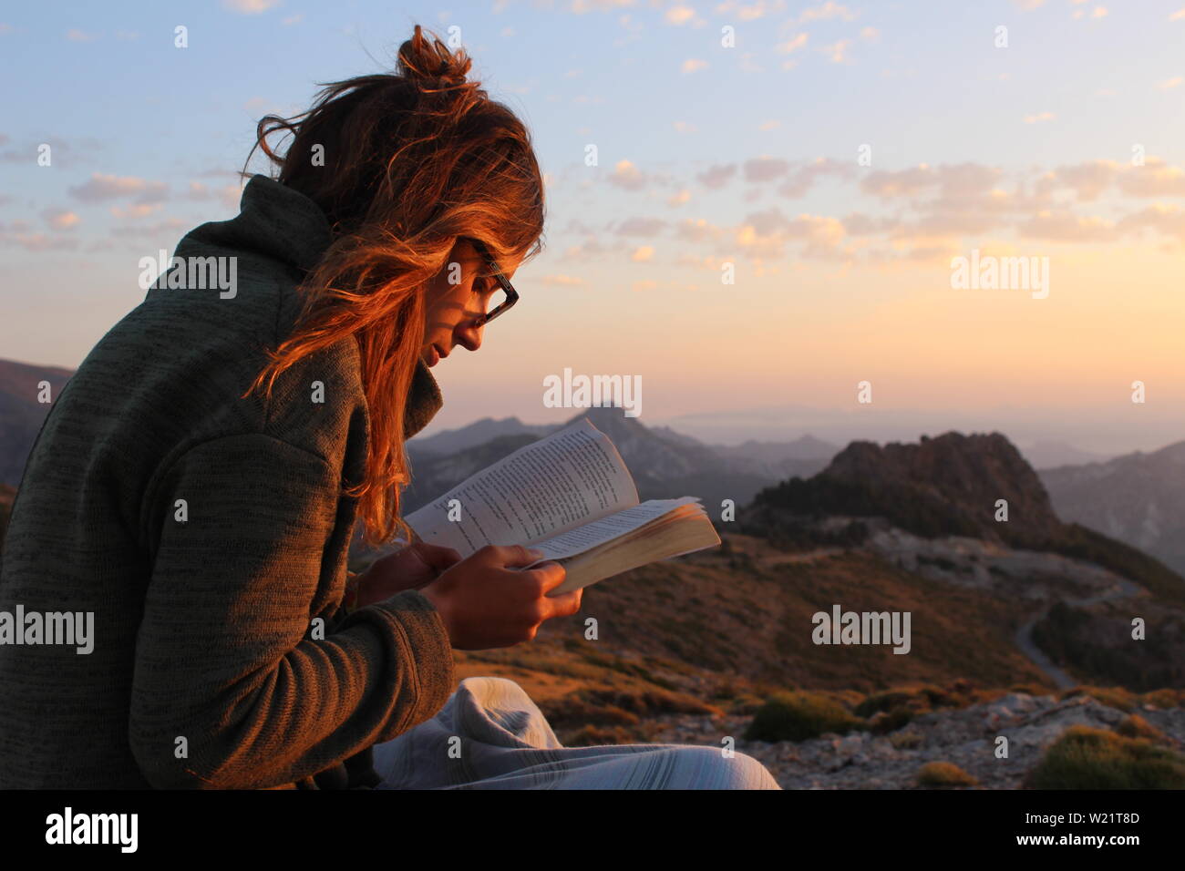Reading at Sunset in the Sierra Nevada Stock Photo - Alamy