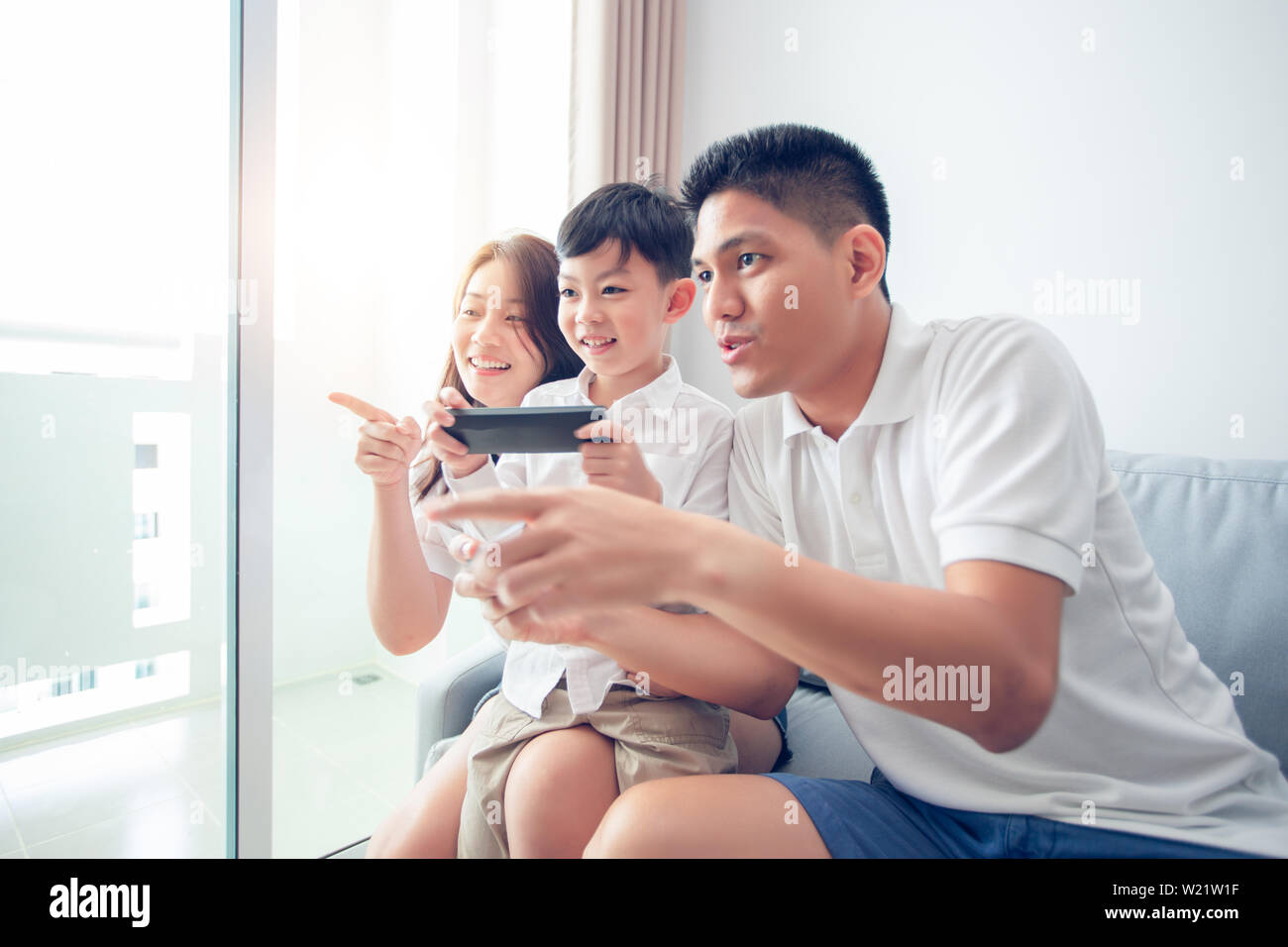 Asian american family mom dad father hi-res stock photography and images - Alamy